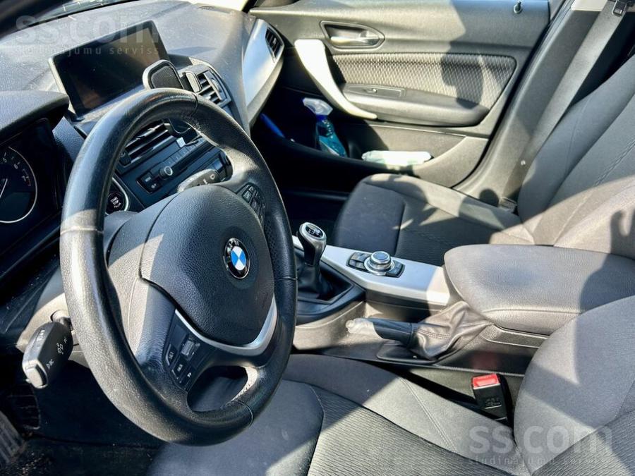 Blue BMW 116 2011 in Riga, with an engine capacity of 2.00 L and mileage of 270 thousand km for 6688 €, photo 14 on AUTOMOTO.COM.LV