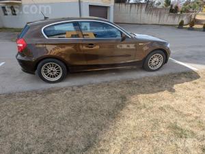 Brown BMW 116 2010 in Riga, with an engine capacity of 2.00 L and mileage of 252 thousand km for 1890 €, photo  on AUTOMOTO.COM.LV