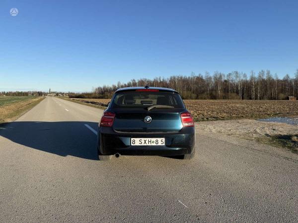 Green BMW 116 2013 in Panevezys, with an engine capacity of 1.60 L and mileage of 229 thousand km for 5700 €, photo 4 on AUTOMOTO.COM.LV