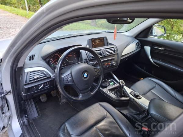 Grey BMW 116 2011 in Saldus, with an engine capacity of 1.60 L and mileage of 170 thousand km for 5499 €, photo 11 on AUTOMOTO.COM.LV