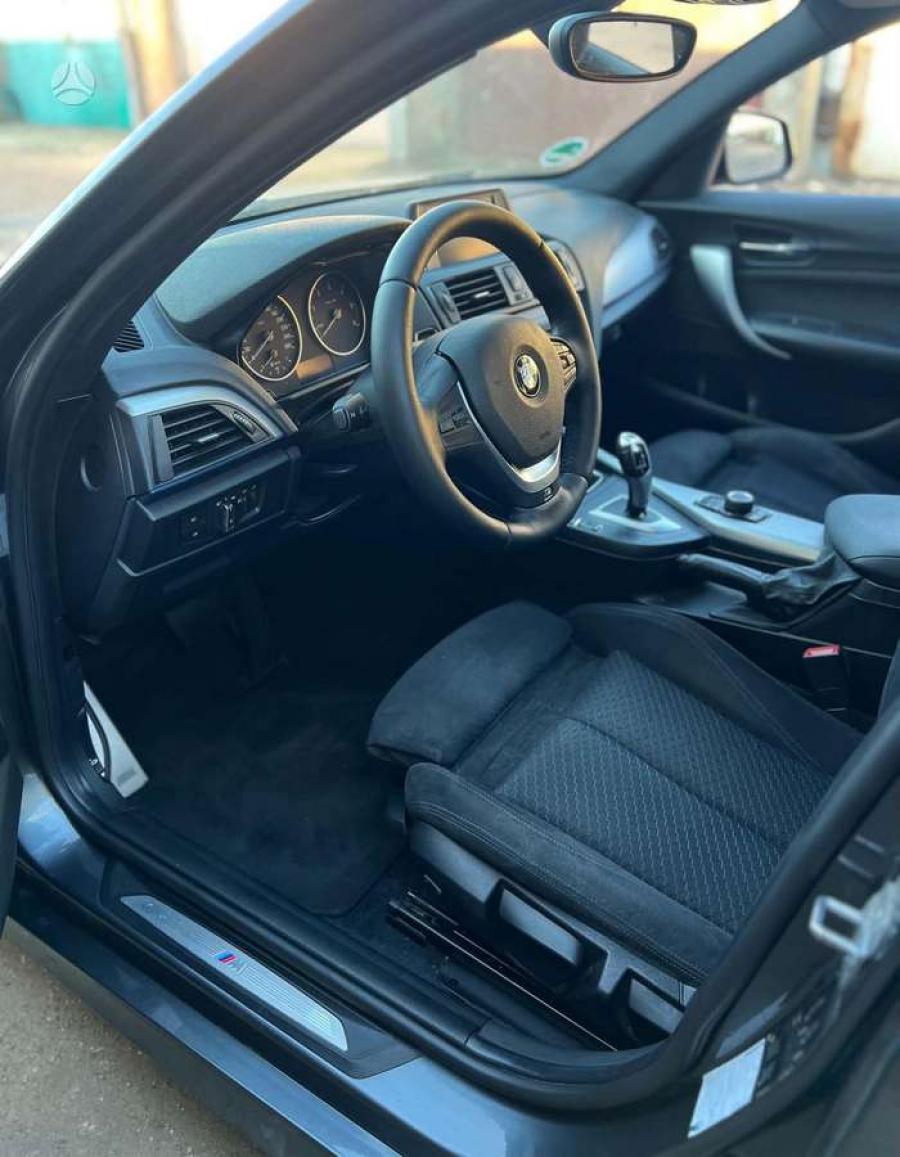 Grey BMW 116 2014 in Kaunas, with an engine capacity of 2.00 L and mileage of 304 thousand km for 6999 €, photo 10 on AUTOMOTO.COM.LV