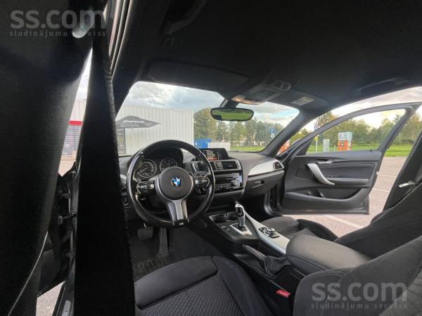 Grey BMW 116 2016 in Riga, with an engine capacity of 1.50 L and mileage of 213 thousand km for 8600 €, photo 6 on AUTOMOTO.COM.LV