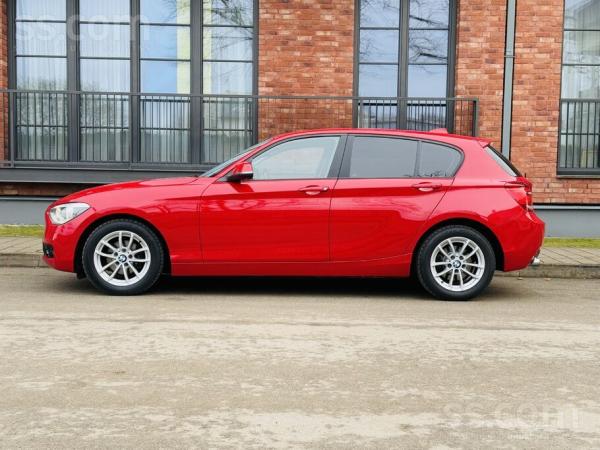 Red BMW 116 2012 in Riga, with an engine capacity of 2.00 L and mileage of 265 thousand km for 6750 €, photo 2 on AUTOMOTO.COM.LV