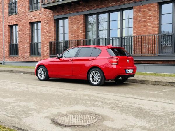 Red BMW 116 2012 in Riga, with an engine capacity of 2.00 L and mileage of 265 thousand km for 6750 €, photo 3 on AUTOMOTO.COM.LV