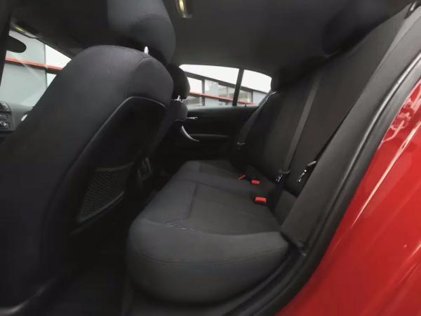 Red BMW 116 2012 in Riga, with an engine capacity of 1.60 L and mileage of 163 thousand km for 5990 €, photo 4 on AUTOMOTO.COM.LV
