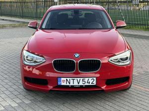Red BMW 116 2012 in Jonava, with an engine capacity of 2.00 L and mileage of 233 thousand km for 4900 €, photo  on AUTOMOTO.COM.LV