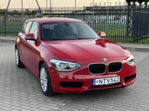 Red BMW 116 2012 in Jonava, with an engine capacity of 2.00 L and mileage of 233 thousand km for 4900 €, photo 3 on AUTOMOTO.COM.LV