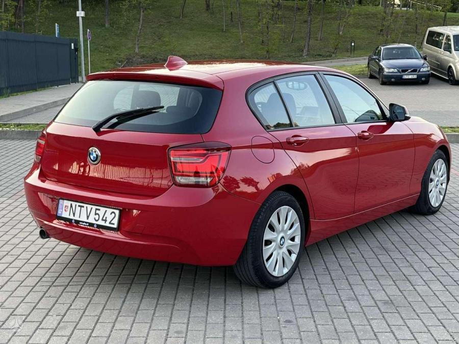 Red BMW 116 2012 in Jonava, with an engine capacity of 2.00 L and mileage of 233 thousand km for 4900 €, photo 6 on AUTOMOTO.COM.LV