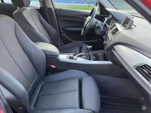 Red BMW 116 2012 in Jonava, with an engine capacity of 2.00 L and mileage of 233 thousand km for 4900 €, photo 14 on AUTOMOTO.COM.LV