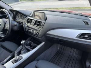 Red BMW 116 2012 in Jonava, with an engine capacity of 2.00 L and mileage of 233 thousand km for 4900 €, photo 15 on AUTOMOTO.COM.LV