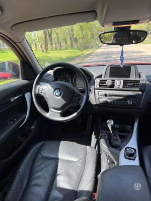 Red BMW 116 2012 in Klaipeda, with an engine capacity of 2.00 L and mileage of 330 thousand km for 4750 €, photo 6 on AUTOMOTO.COM.LV