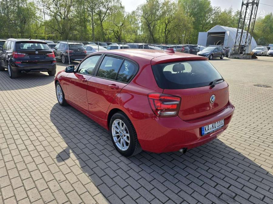 Red BMW 116 2013 in Marijampole, with an engine capacity of 1.60 L and mileage of 180 thousand km for 5600 €, photo 4 on AUTOMOTO.COM.LV