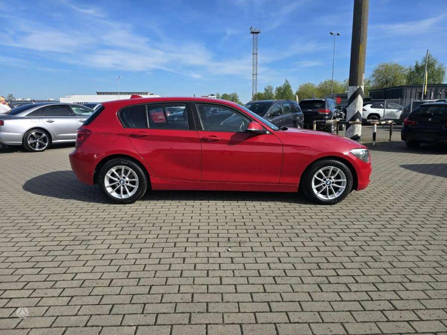 Red BMW 116 2013 in Marijampole, with an engine capacity of 1.60 L and mileage of 180 thousand km for 5600 €, photo 7 on AUTOMOTO.COM.LV