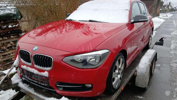 Red BMW 116 2014 in Utena, with an engine capacity of 2.00 L and mileage of 142 thousand km for 4999 €, photo 1 on AUTOMOTO.COM.LV