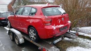 Red BMW 116 2014 in Utena, with an engine capacity of 2.00 L and mileage of 142 thousand km for 4999 €, photo 2 on AUTOMOTO.COM.LV