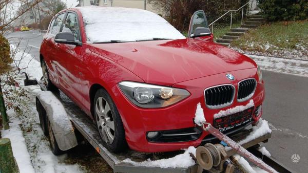 Red BMW 116 2014 in Utena, with an engine capacity of 2.00 L and mileage of 142 thousand km for 4999 €, photo 5 on AUTOMOTO.COM.LV