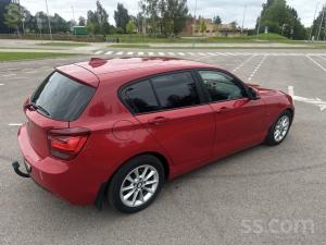 Red BMW 116 2012 in Valmiera, with an engine capacity of 1.60 L and mileage of 193 thousand km for 6500 €, photo  on AUTOMOTO.COM.LV