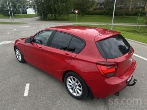 Red BMW 116 2012 in Valmiera, with an engine capacity of 1.60 L and mileage of 193 thousand km for 6500 €, photo 3 on AUTOMOTO.COM.LV