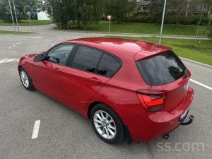 Red BMW 116 2012 in Valmiera, with an engine capacity of 1.60 L and mileage of 193 thousand km for 6500 €, photo 4 on AUTOMOTO.COM.LV