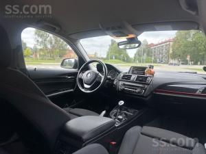 Red BMW 116 2012 in Valmiera, with an engine capacity of 1.60 L and mileage of 193 thousand km for 6500 €, photo 8 on AUTOMOTO.COM.LV