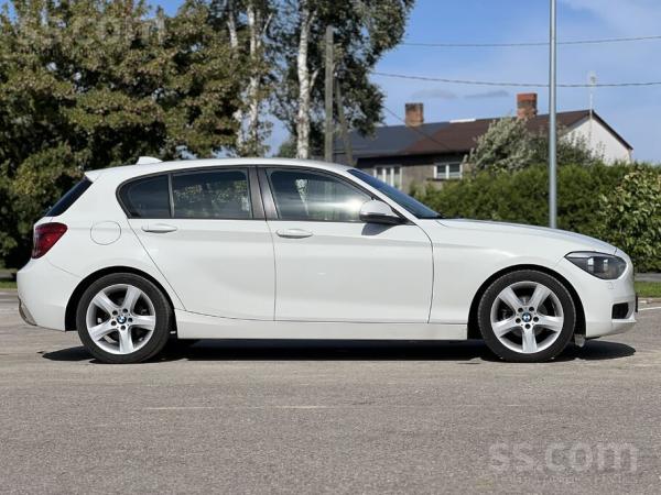 White BMW 116 2011 in Bauska, with an engine capacity of 2.00 L and mileage of 261 thousand km for 4399 €, photo 3 on AUTOMOTO.COM.LV