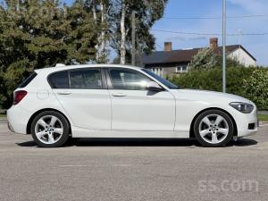 White BMW 116 2011 in Bauska, with an engine capacity of 2.00 L and mileage of 261 thousand km for 4399 €, photo 4 on AUTOMOTO.COM.LV