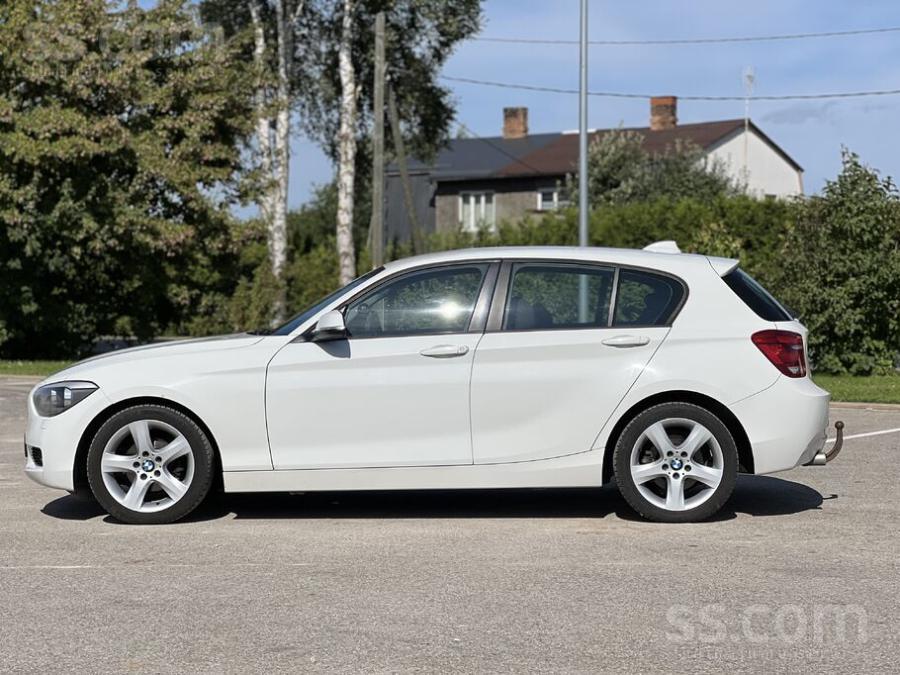 White BMW 116 2011 in Bauska, with an engine capacity of 2.00 L and mileage of 261 thousand km for 4399 €, photo 5 on AUTOMOTO.COM.LV