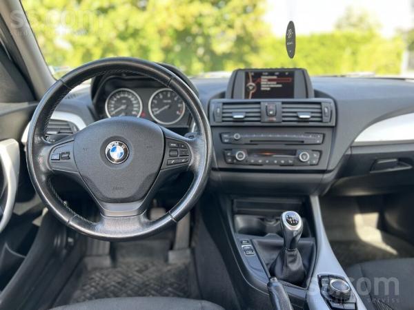 White BMW 116 2011 in Bauska, with an engine capacity of 2.00 L and mileage of 261 thousand km for 4399 €, photo 6 on AUTOMOTO.COM.LV