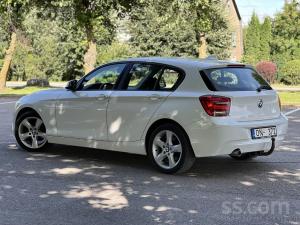 White BMW 116 2011 in Bauska, with an engine capacity of 2.00 L and mileage of 261 thousand km for 4399 €, photo 13 on AUTOMOTO.COM.LV