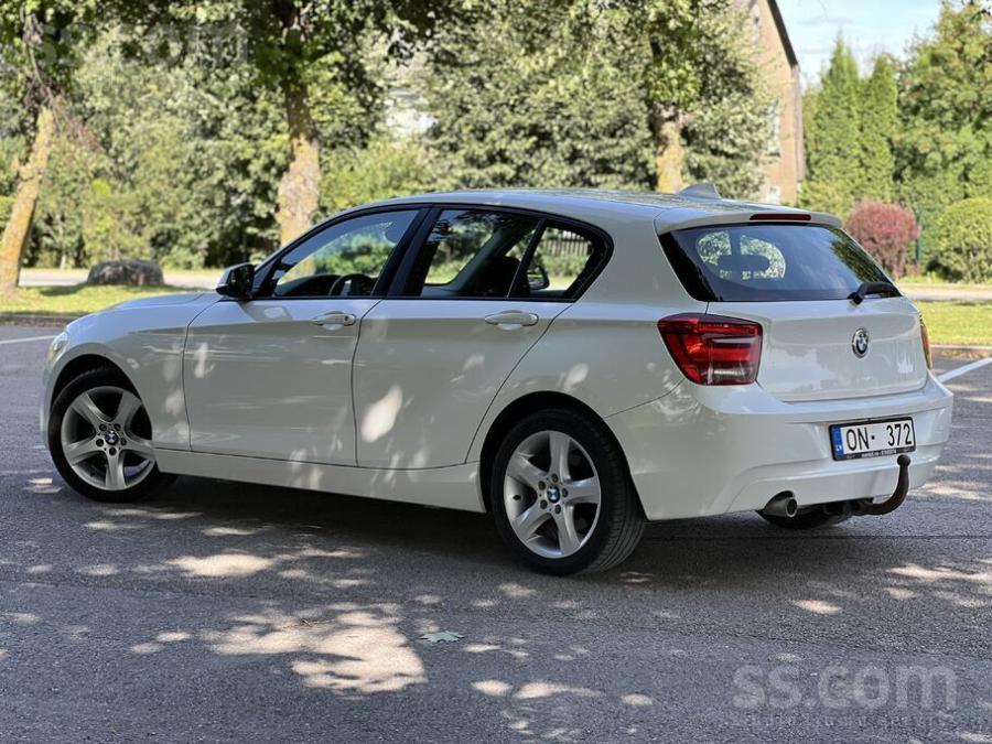 White BMW 116 2011 in Bauska, with an engine capacity of 2.00 L and mileage of 261 thousand km for 4399 €, photo 13 on AUTOMOTO.COM.LV