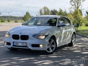 White BMW 116 2011 in Bauska, with an engine capacity of 2.00 L and mileage of 261 thousand km for 4399 €, photo 14 on AUTOMOTO.COM.LV