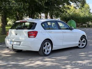 White BMW 116 2011 in Bauska, with an engine capacity of 2.00 L and mileage of 261 thousand km for 4399 €, photo 15 on AUTOMOTO.COM.LV