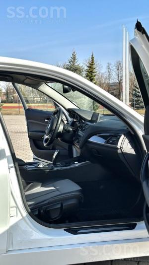 White BMW 116 2012 in Jelgava, with an engine capacity of 2.00 L and mileage of 243 thousand km for 8300 €, photo 12 on AUTOMOTO.COM.LV