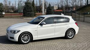 White BMW 116 2012 in Jelgava, with an engine capacity of 2.00 L and mileage of 243 thousand km for 8300 €, photo 16 on AUTOMOTO.COM.LV