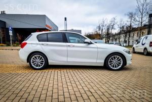 White BMW 116 2015 in Riga, with an engine capacity of 1.50 L and mileage of 220 thousand km for 8990 €, photo 7 on AUTOMOTO.COM.LV