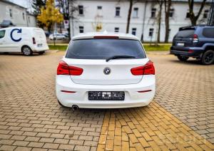 White BMW 116 2015 in Riga, with an engine capacity of 1.50 L and mileage of 220 thousand km for 8990 €, photo 9 on AUTOMOTO.COM.LV