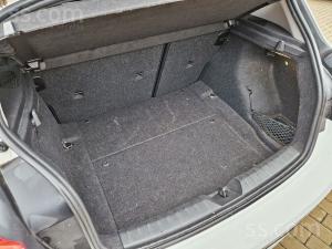 White BMW 116 2015 in Riga, with an engine capacity of 1.50 L and mileage of 220 thousand km for 8990 €, photo 13 on AUTOMOTO.COM.LV
