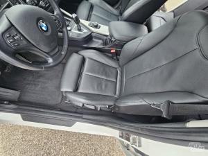 White BMW 116 2016 in Kaunas, with an engine capacity of 1.50 L and mileage of 155 thousand km for 8350 €, photo 12 on AUTOMOTO.COM.LV