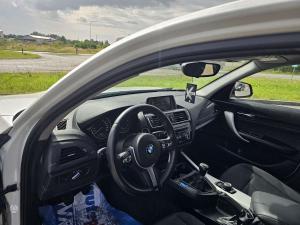 White BMW 116 2017 in Ukmerge, with an engine capacity of 1.50 L and mileage of 215 thousand km for 5950 €, photo 16 on AUTOMOTO.COM.LV