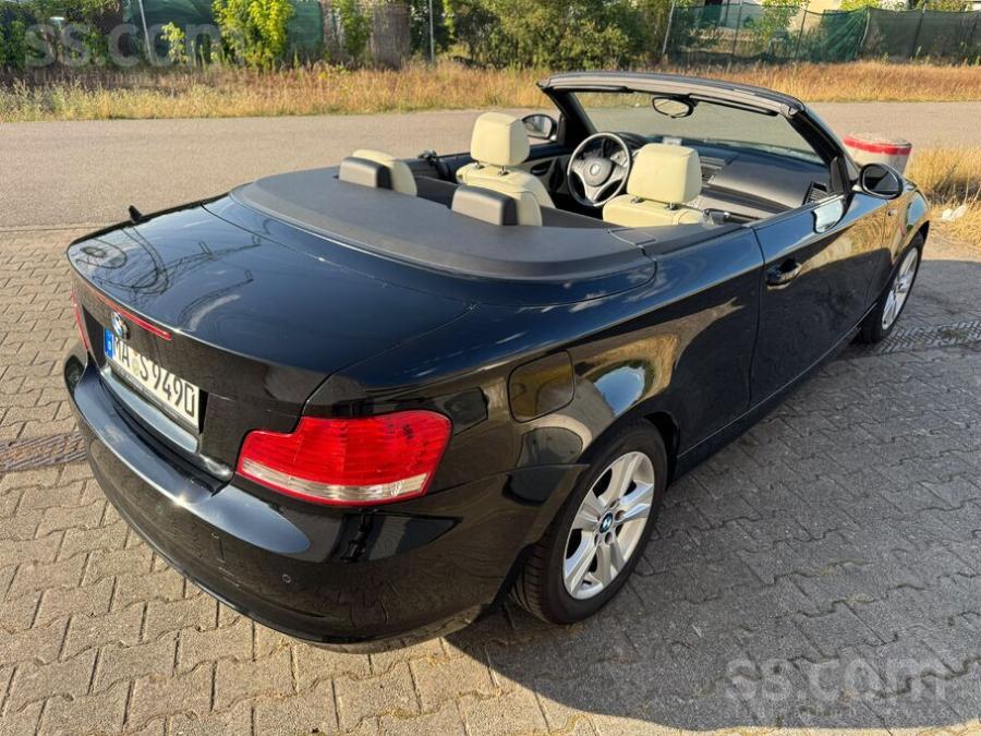 Black BMW 118 2009 in Riga, with an engine capacity of 2.00 L and mileage of 312 thousand km for 3900 €, photo 5 on AUTOMOTO.COM.LV