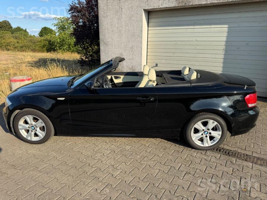 Black BMW 118 2009 in Riga, with an engine capacity of 2.00 L and mileage of 312 thousand km for 3900 €, photo 9 on AUTOMOTO.COM.LV