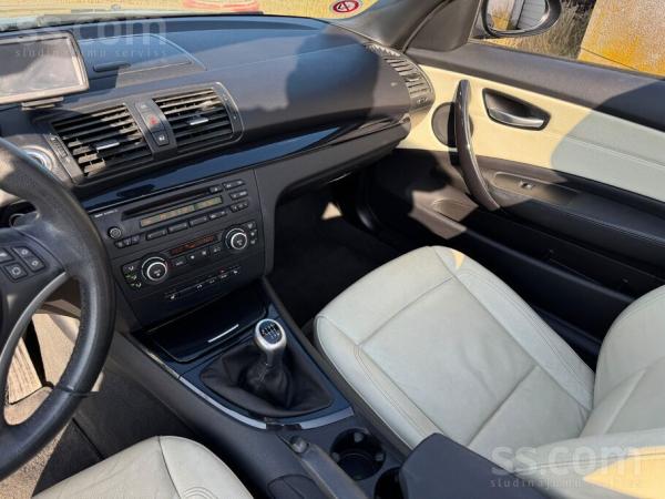Black BMW 118 2009 in Riga, with an engine capacity of 2.00 L and mileage of 312 thousand km for 3900 €, photo 10 on AUTOMOTO.COM.LV