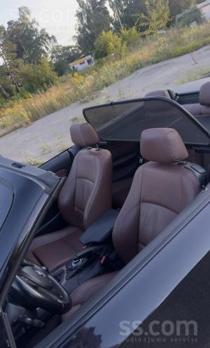 Black BMW 118 2009 in Riga, with an engine capacity of 2.00 L and mileage of 237 thousand km for 9200 €, photo 10 on AUTOMOTO.COM.LV