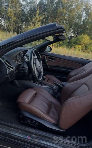 Black BMW 118 2009 in Riga, with an engine capacity of 2.00 L and mileage of 237 thousand km for 9200 €, photo 11 on AUTOMOTO.COM.LV