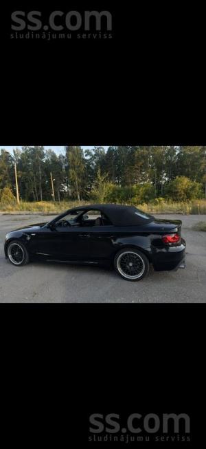 Black BMW 118 2009 in Riga, with an engine capacity of 2.00 L and mileage of 237 thousand km for 7950 €, photo 5 on AUTOMOTO.COM.LV