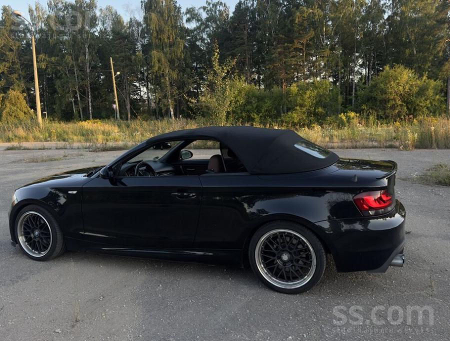Black BMW 118 2009 in Riga, with an engine capacity of 2.00 L and mileage of 237 thousand km for 7950 €, photo 9 on AUTOMOTO.COM.LV