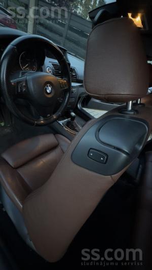 Black BMW 118 2009 in Riga, with an engine capacity of 2.00 L and mileage of 237 thousand km for 7950 €, photo 17 on AUTOMOTO.COM.LV