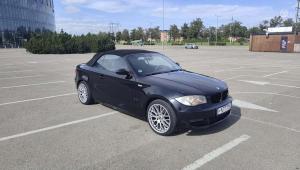 Black BMW 118 2009 in Siauliai, with an engine capacity of 2.00 L and mileage of 195 thousand km for 4400 €, photo 1 on AUTOMOTO.COM.LV