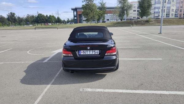 Black BMW 118 2009 in Siauliai, with an engine capacity of 2.00 L and mileage of 195 thousand km for 4400 €, photo 6 on AUTOMOTO.COM.LV