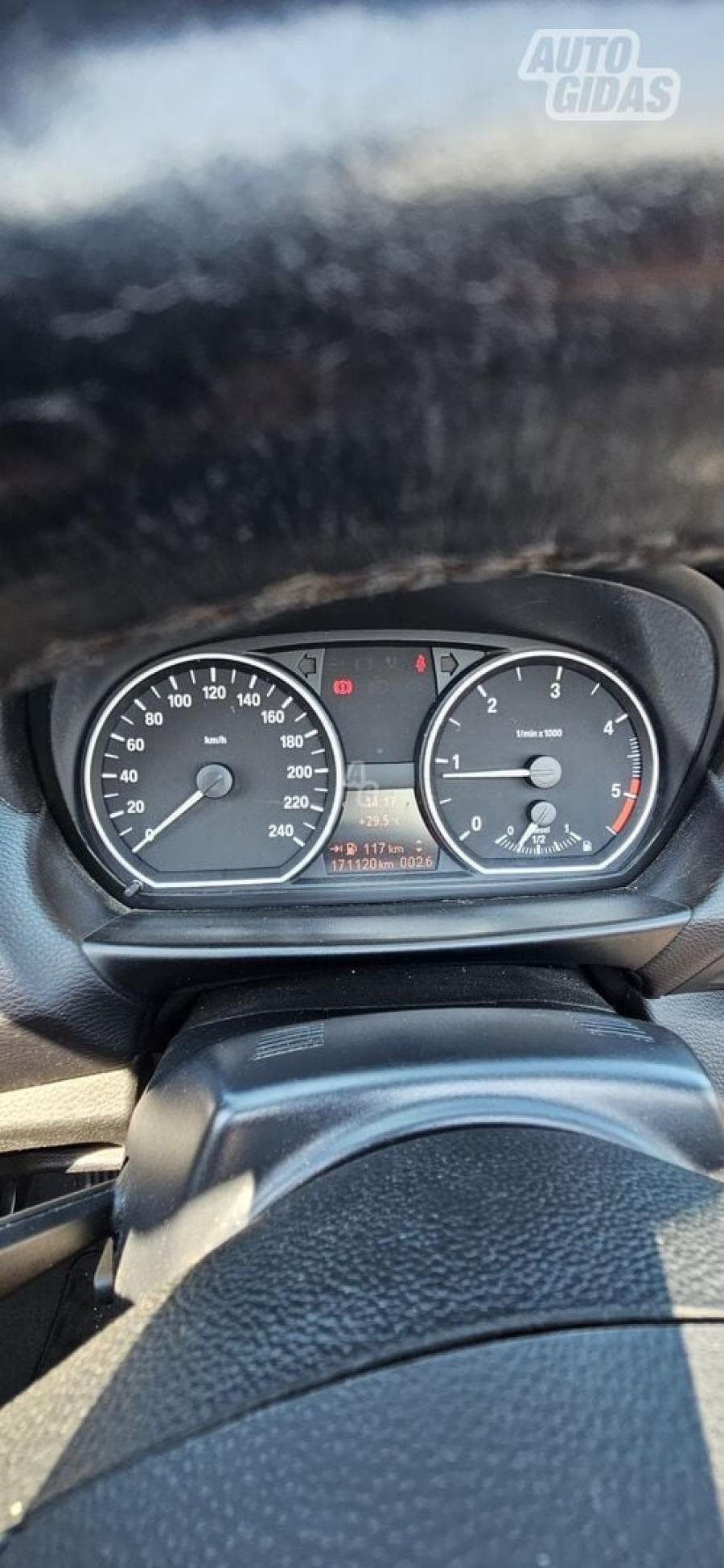 Black BMW 118 2010 in Vilnius, with an engine capacity of 2.00 L and mileage of 171 thousand km for 6790 €, photo 12 on AUTOMOTO.COM.LV